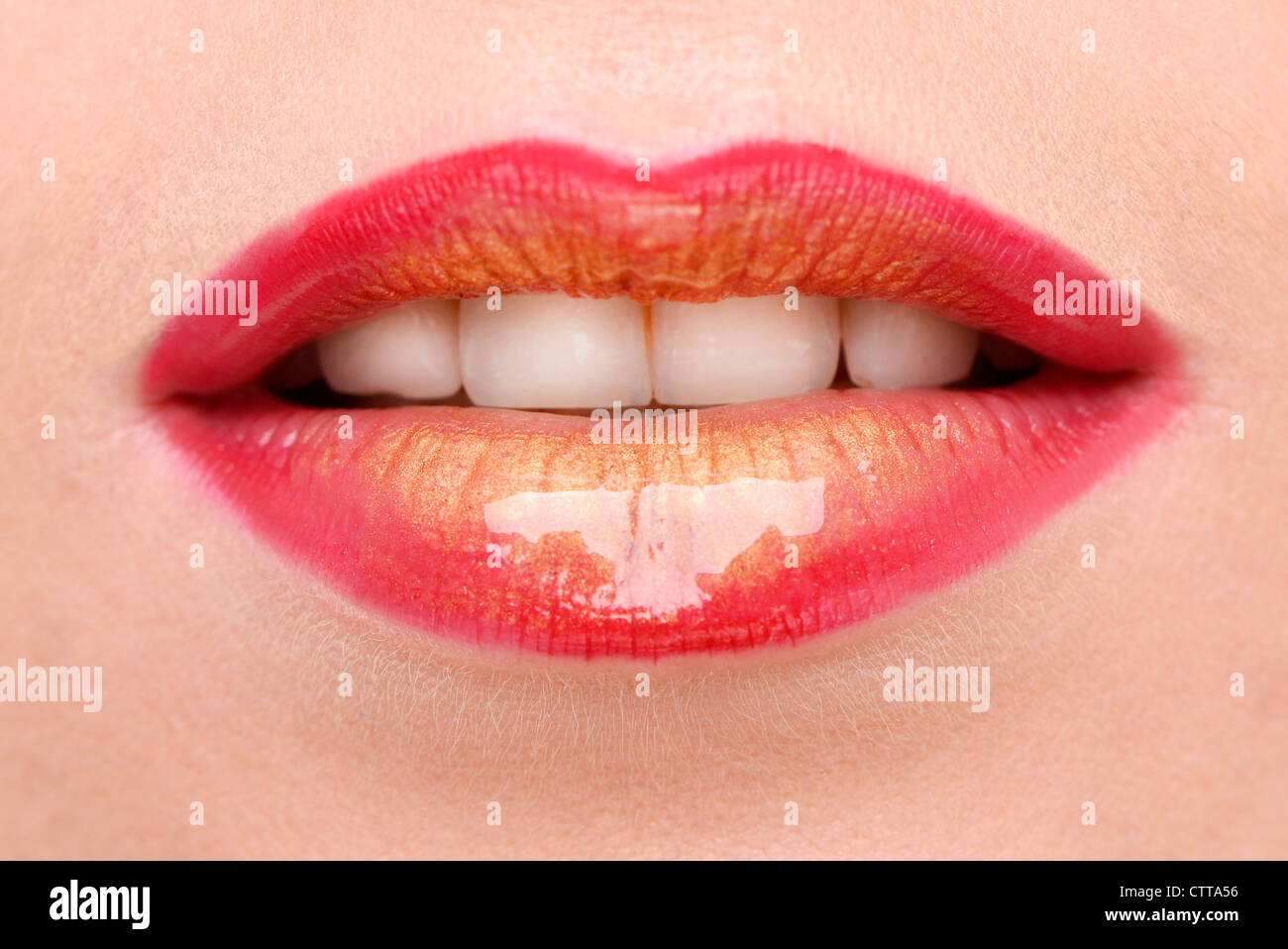 Gold lip gloss hi-res stock photography and images - Alamy
