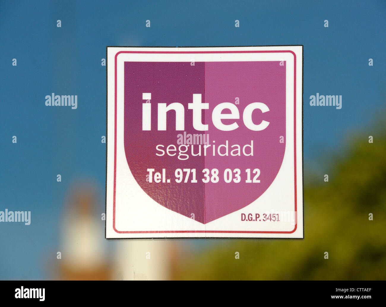 intec seguridad security window sticker menorca spain Stock Photo - Alamy