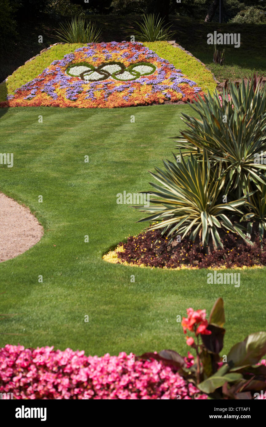 flower beds with plants arranged in the shape of the Olympic rings at ...