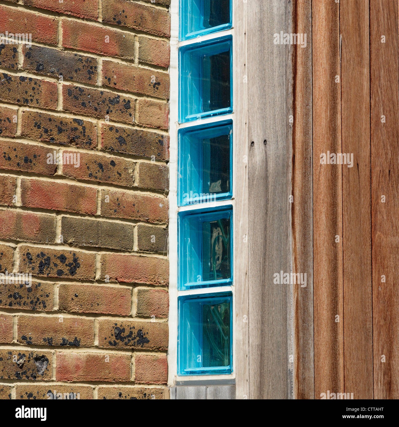 Blue glass bricks within an exterior wall Stock Photo - Alamy