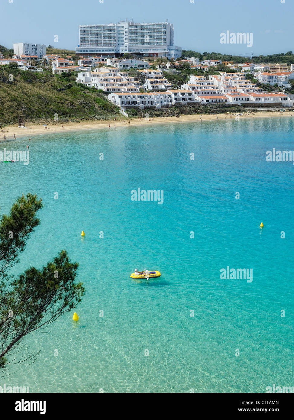 a small yellow dinghy in the mediterranean ocean arenal d'en castell ...