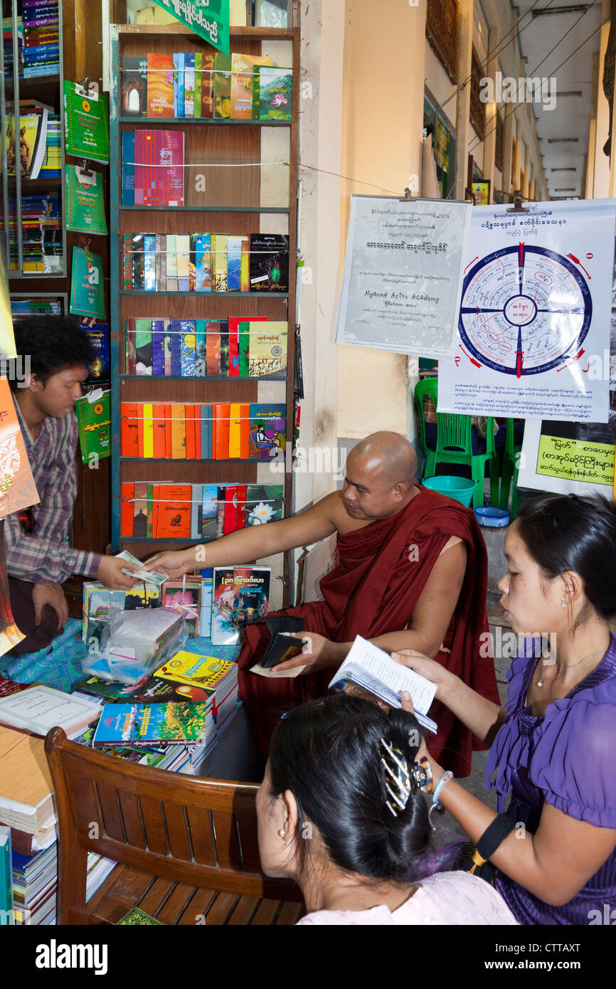 Monk in bookshop, Yangon, Myanmar Stock Photo - Alamy
