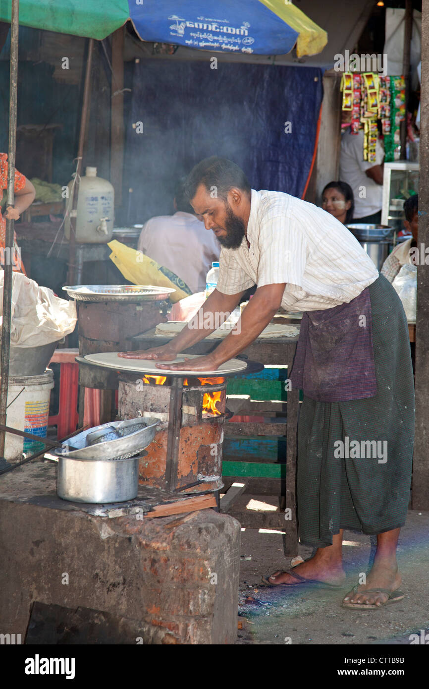 Street vendor making bread, Yangon, Myanmar Stock Photo - Alamy