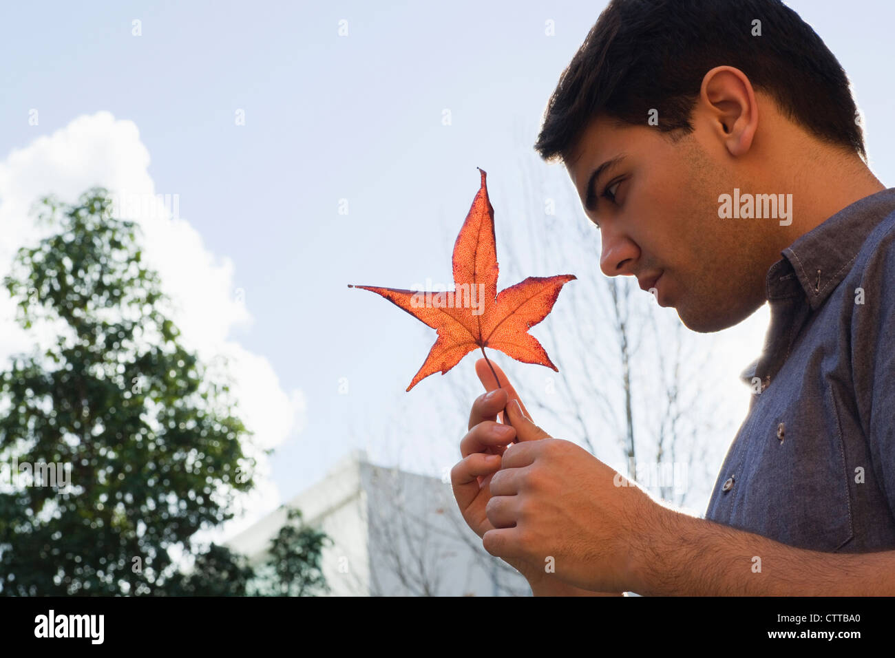 Serious smart casual man holding hi-res stock photography and images ...