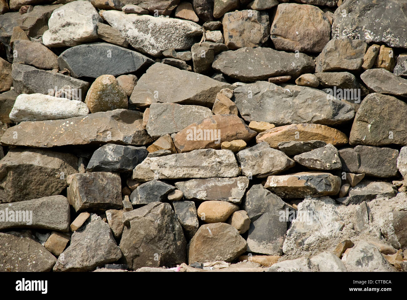 Wall made of rock (asymmetric in shape Stock Photo - Alamy