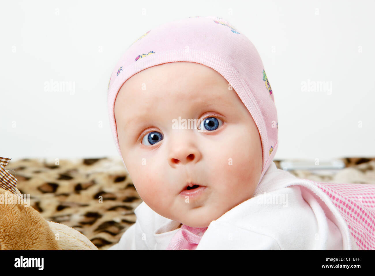 Portrait of a surprised little girl in the hat Stock Photo - Alamy