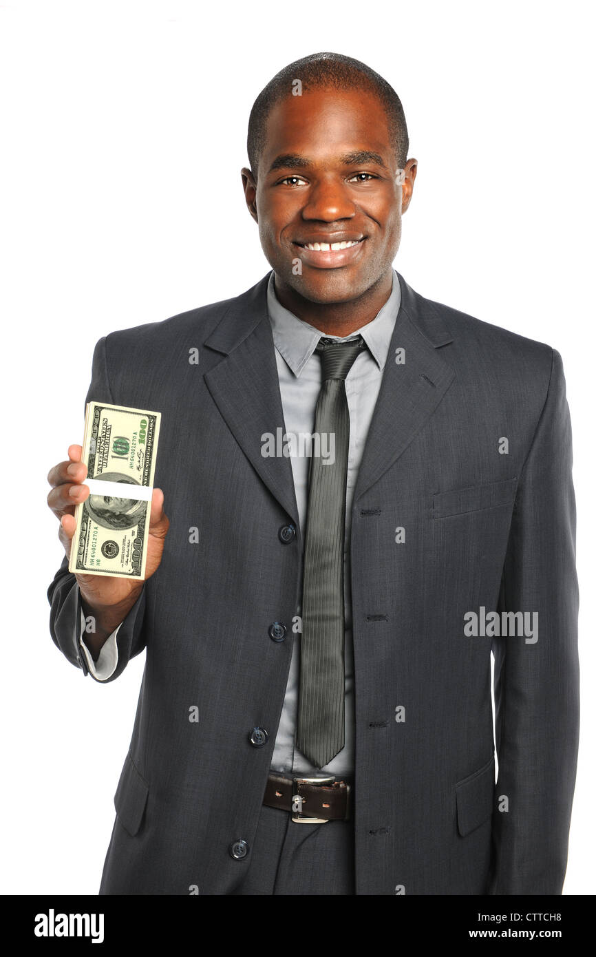 African American businessman holding stack of one hundred dollar bills isolated over white ...
