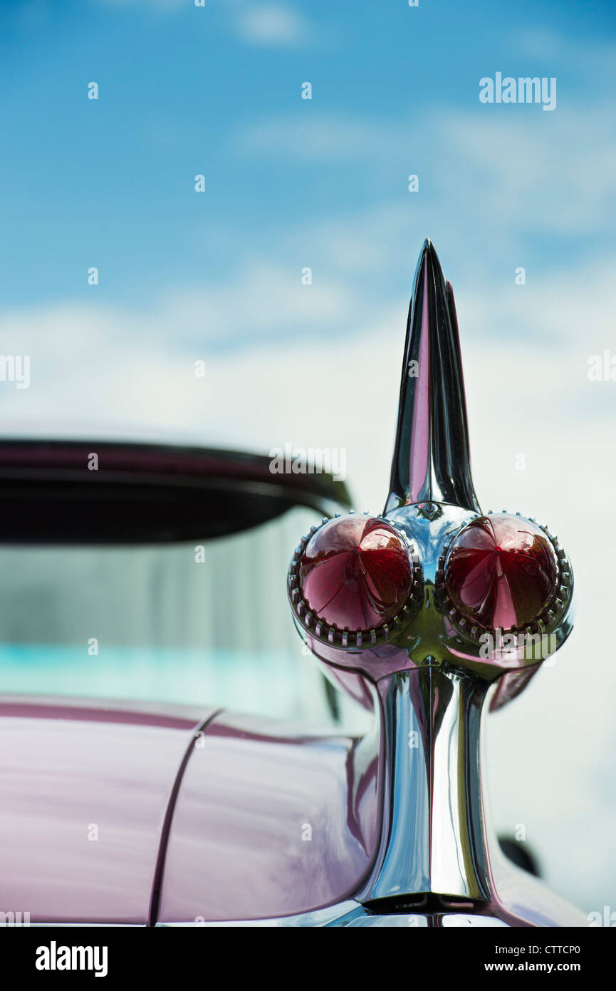 1959 Pink Cadillac. Sharp tail fin with dual bullet tail lights Stock ...