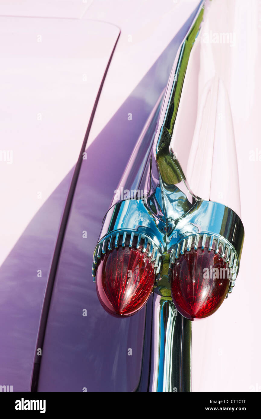 1959 Pink Cadillac. Sharp tail fin with dual bullet tail lights Stock ...