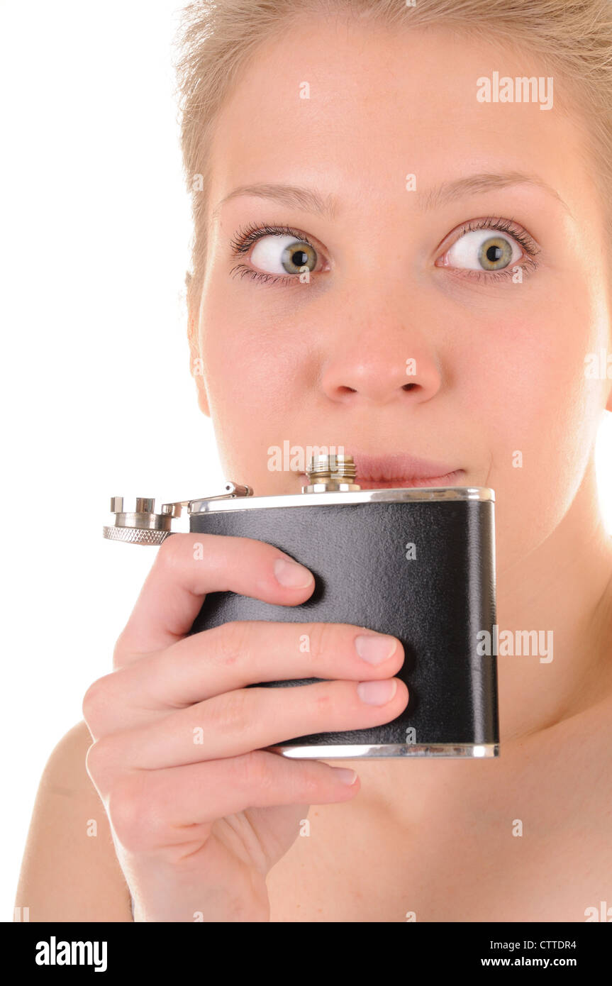 Beauty girl is testing nice smell of drink in a flask Stock Photo - Alamy