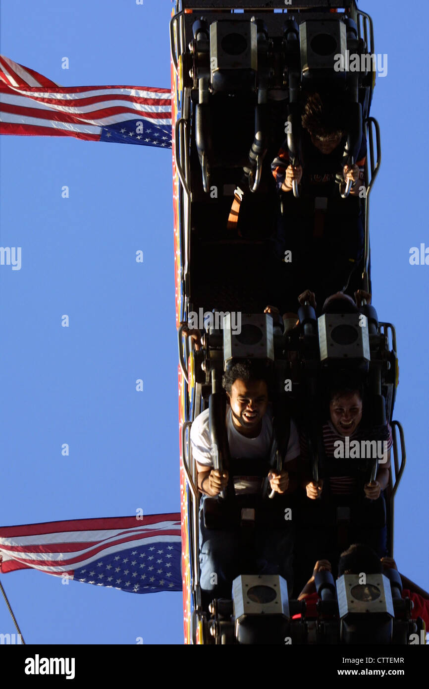 Riders pictured upside down on a carnival ride in Chicago's Logan ...