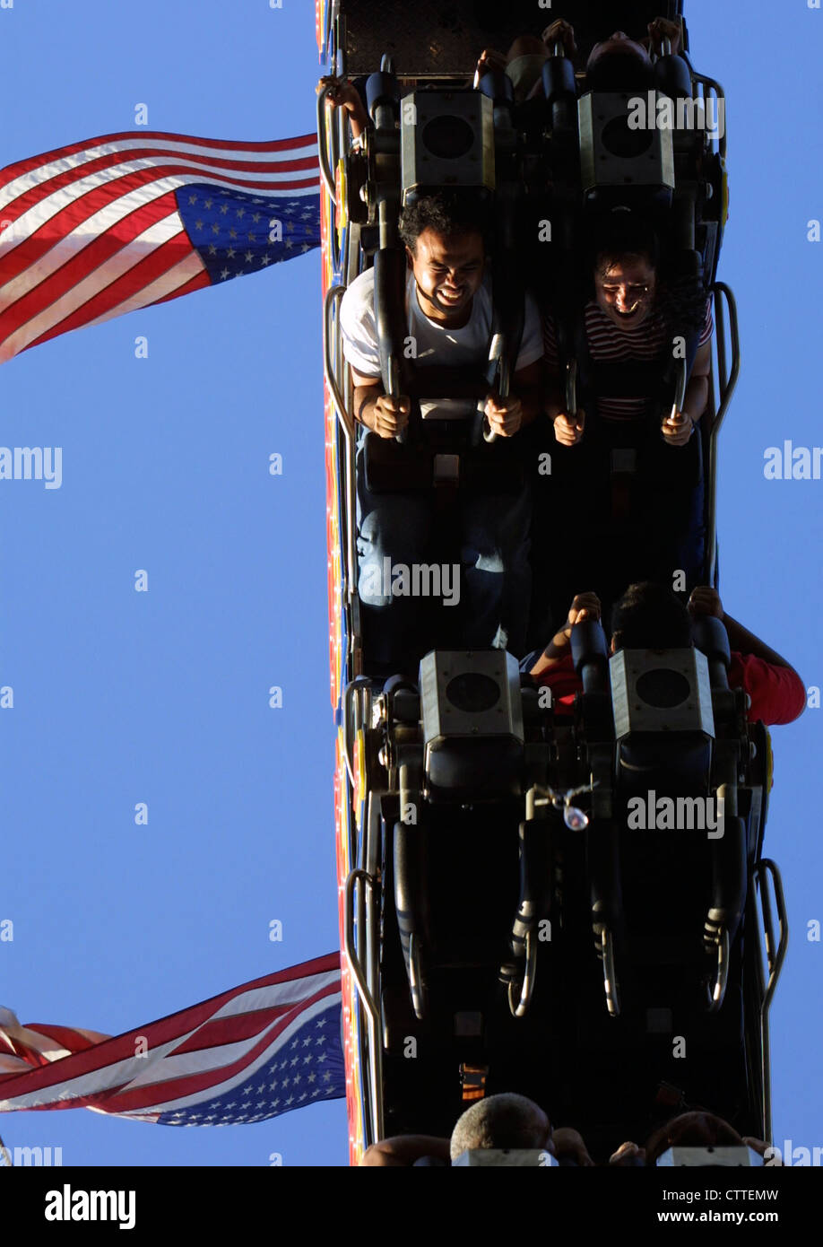 Riders pictured upside down on a carnival ride in Chicago's Logan ...