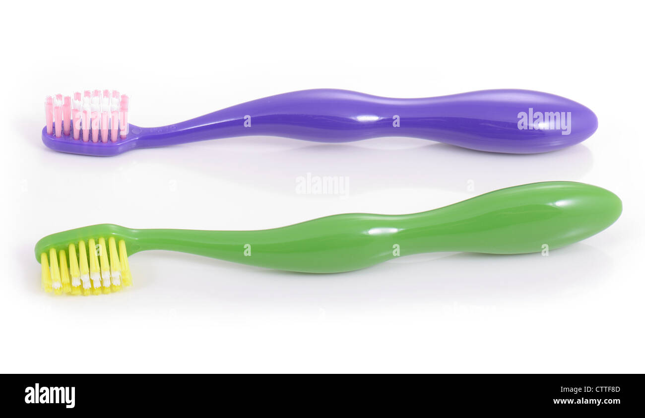 two toothbrush on white background with shadows Stock Photo - Alamy