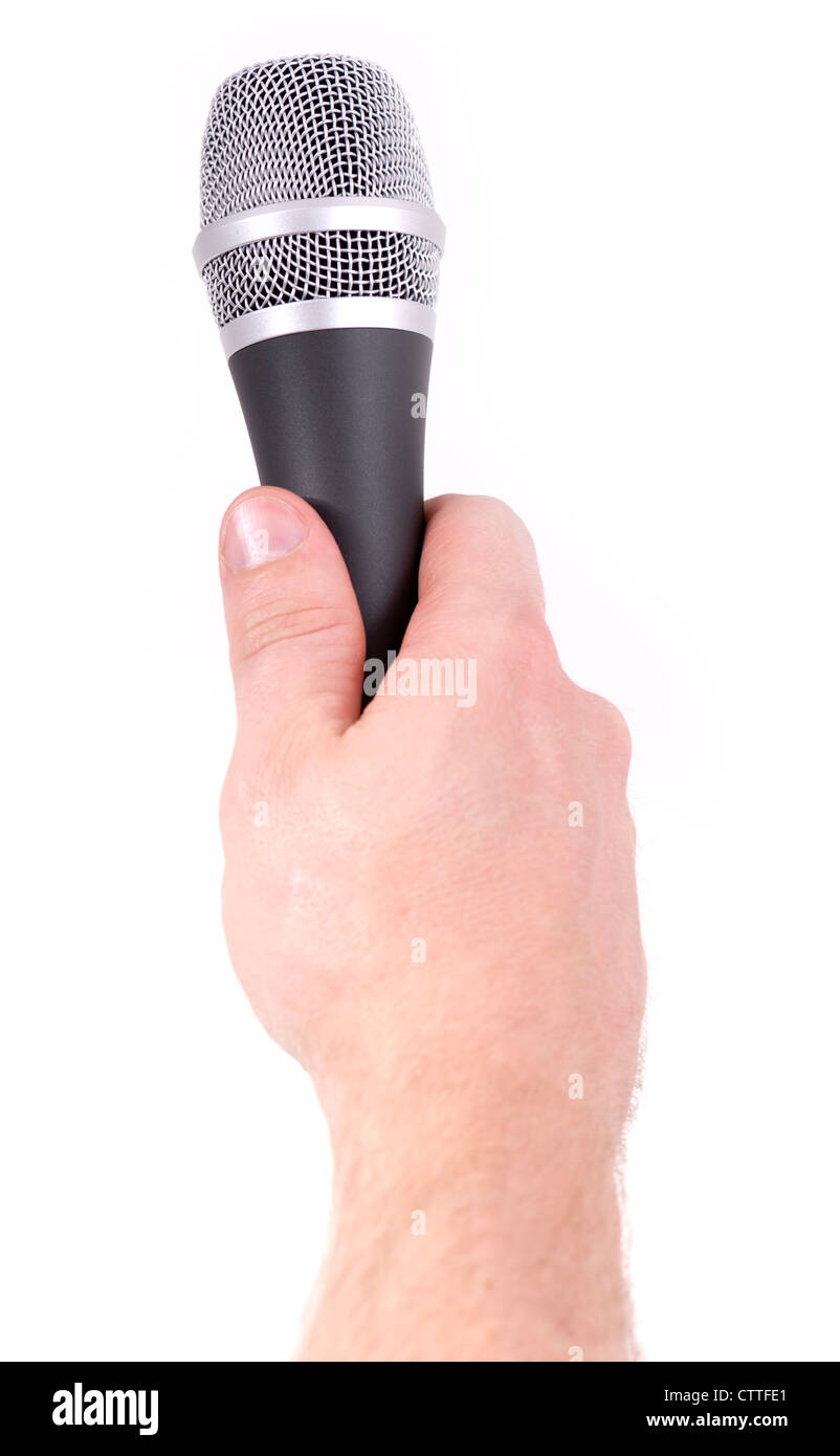 hand holding out a microphone ready for recording Stock Photo - Alamy