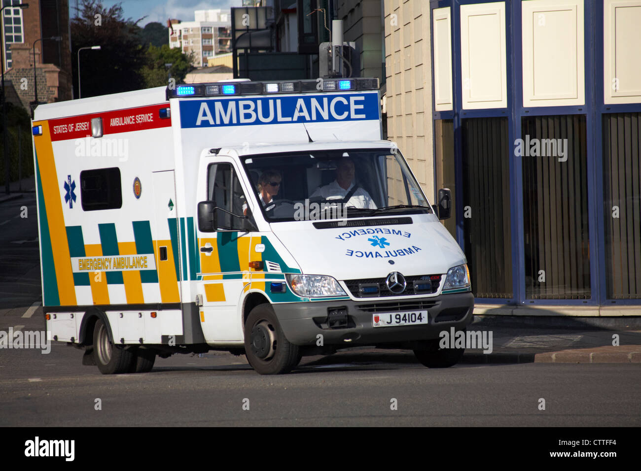 Emergency Ambulance with flashing blue lights attending emergency at St ...