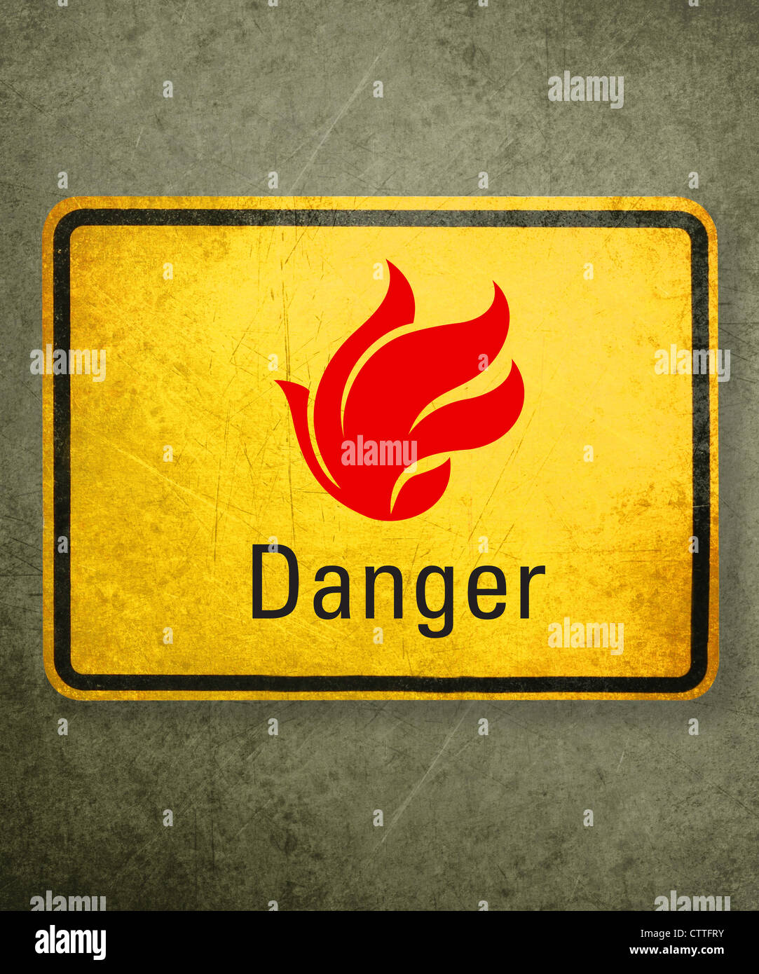 yellow fire alert sign on wall Stock Photo - Alamy