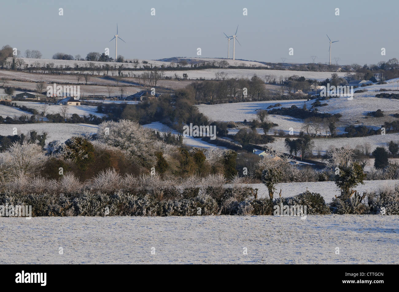 Wind turbines on the horizon of a snow covered landscape, Mount Oriel ...