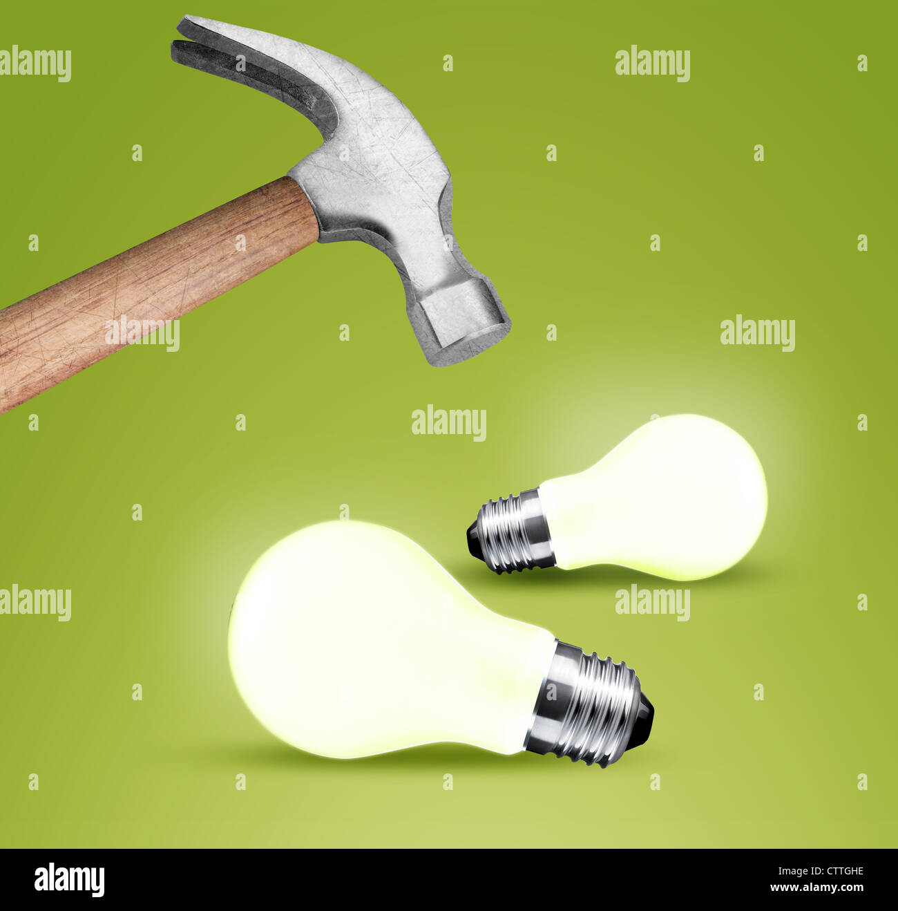 Hammer hitting a lightbulb Stock Photo - Alamy