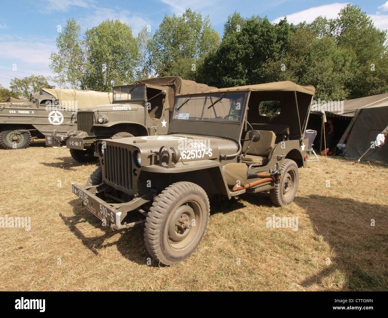 The Willys MB, a World War II-era military jeep, features hood number ...