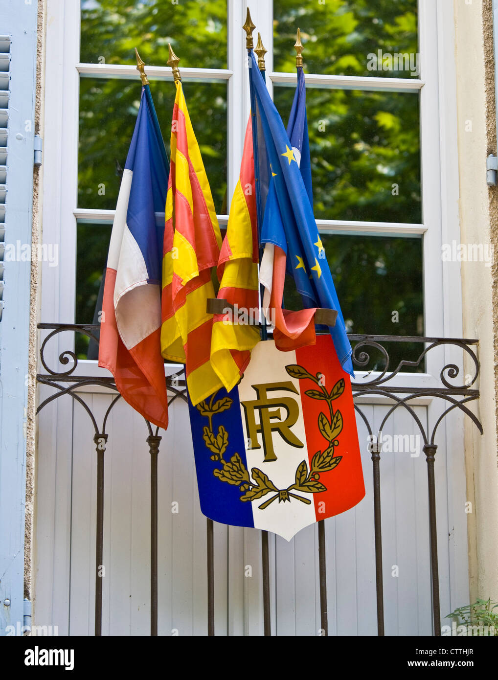 The flags of France Provence and the European Union on a building in ...