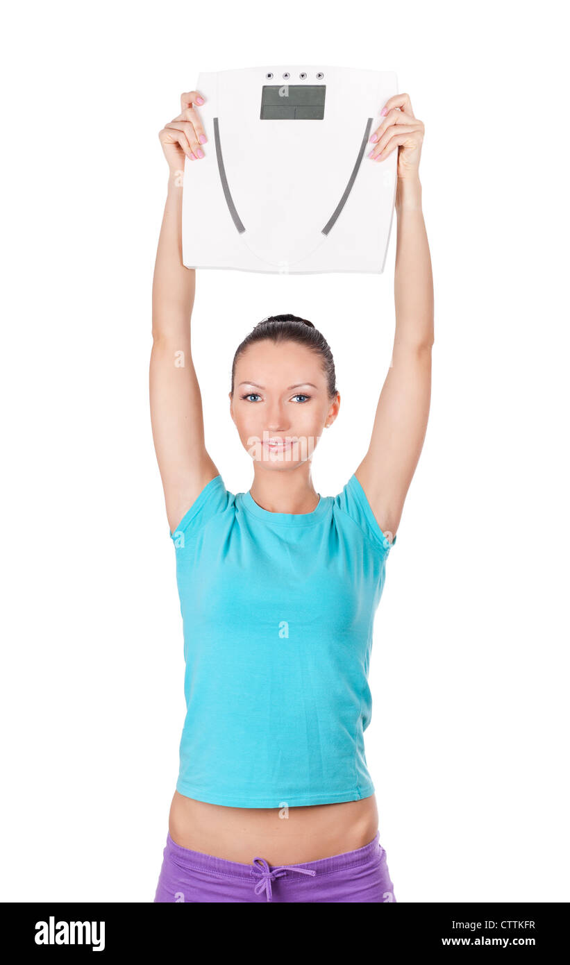 Happy woman holding scale, portrait Stock Photo - Alamy