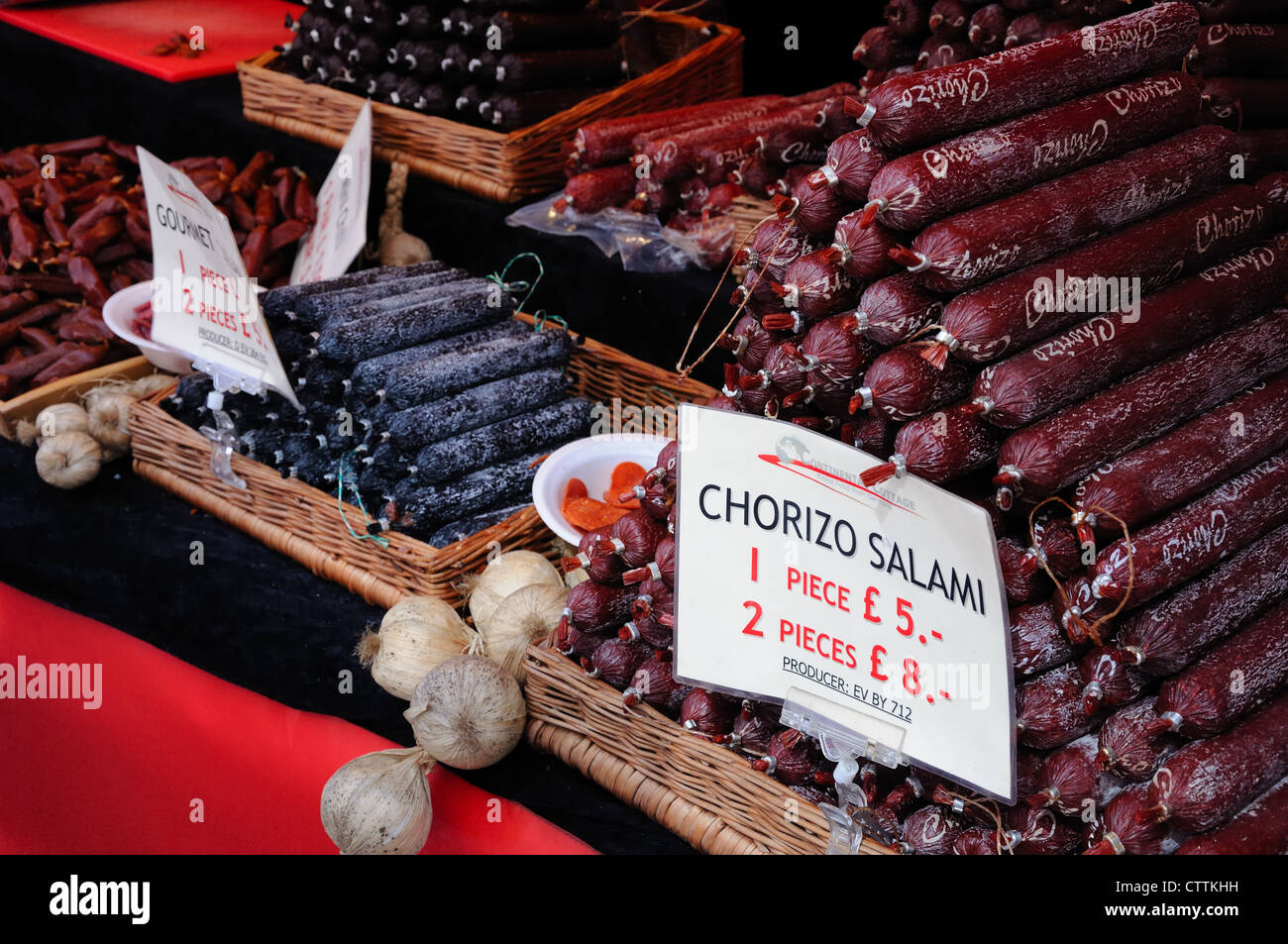 Chorizo salami piled high on market stall Stock Photo - Alamy