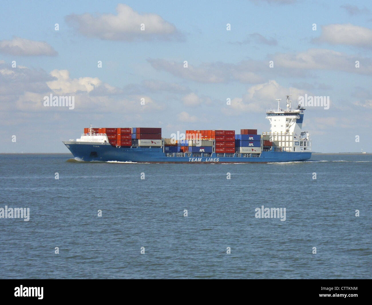 The feeder ship Tina is en route to Bremerhaven, Germany. Feeder ships ...