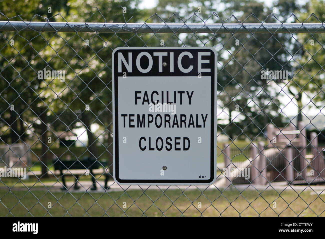 Notice - Facility temporarily closed sign posted to fence Stock Photo ...