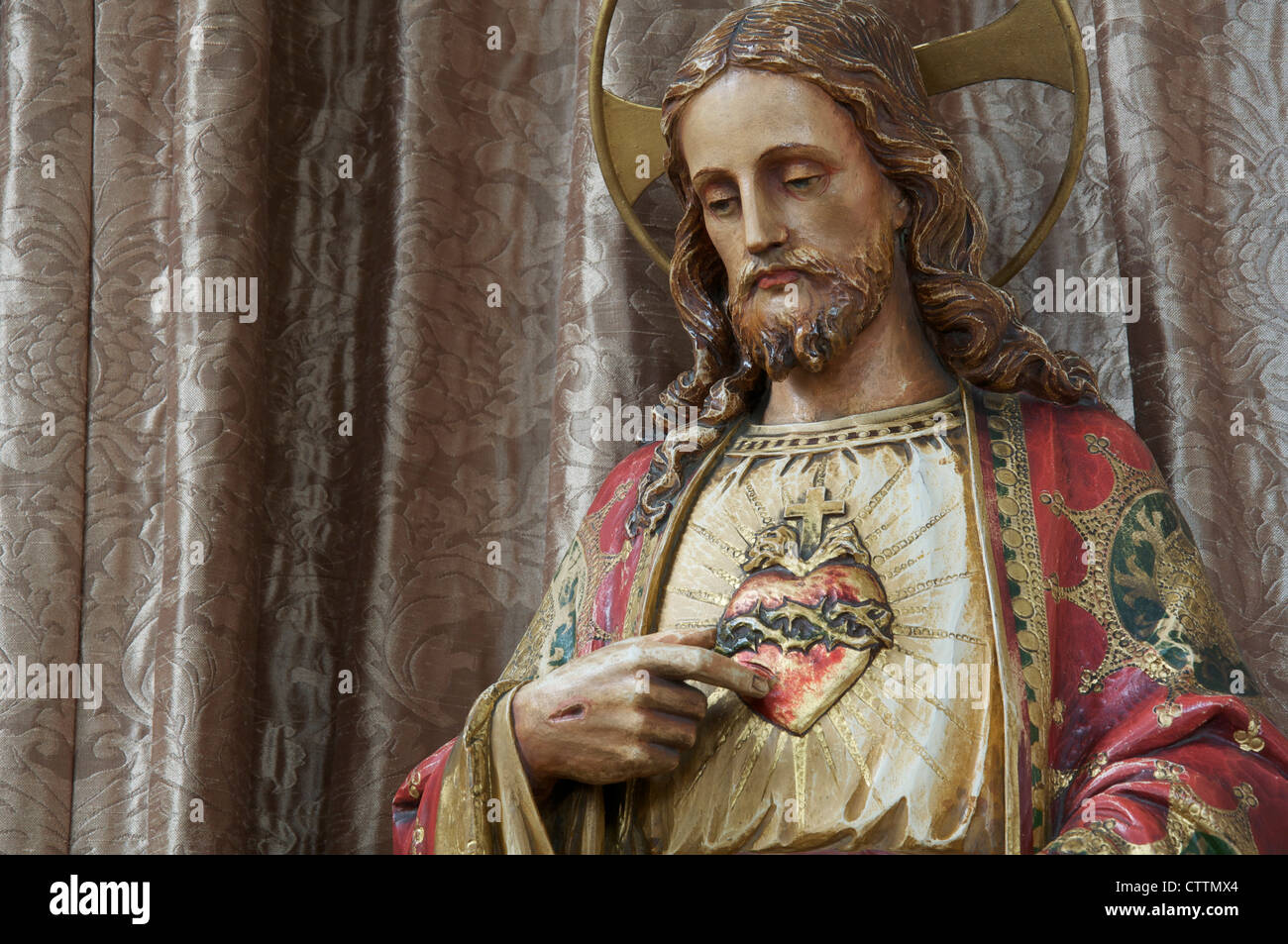 Christianity. A statuette of Jesus Christ. In this traditional Roman ...