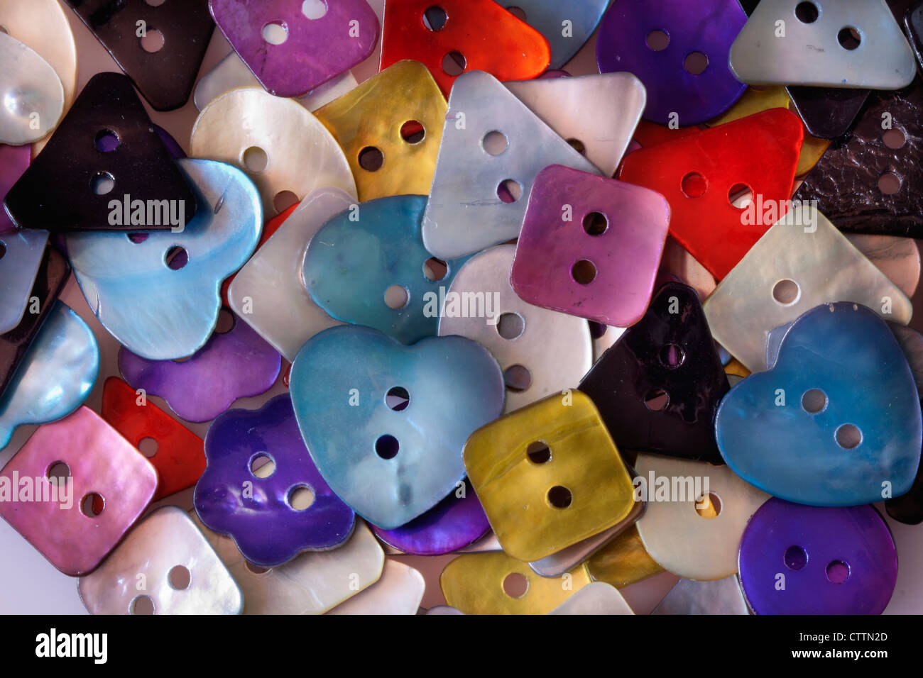 Assorted and colorful mother of pearl buttons. Fashion background Stock ...
