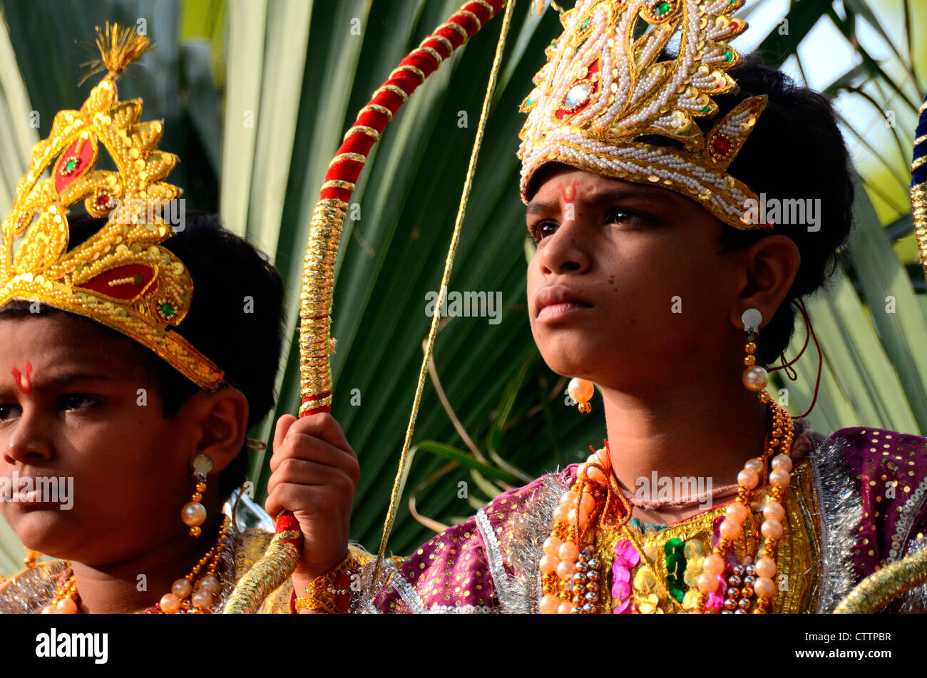Two boys posing as Ram and Laxman Stock Photo - Alamy