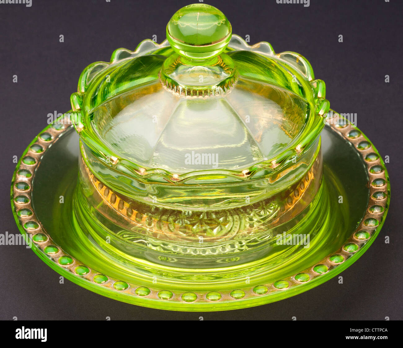Top view of a Ranson "gold band" Vaseline "uranium glass" round covered ...