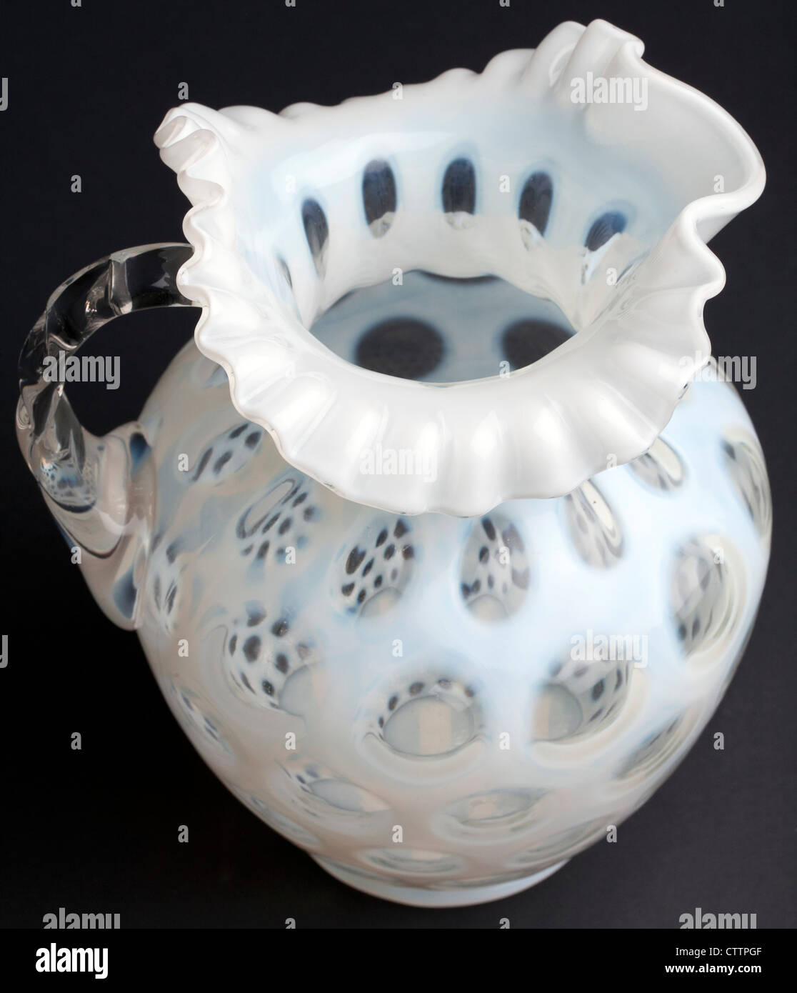 Top view of a Fenton coin dot French opalescent glass pitcher Stock ...