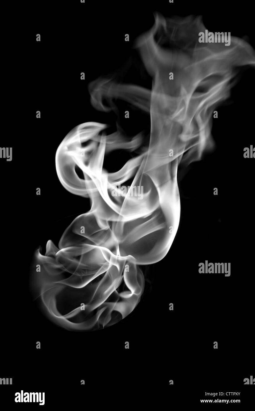 white fire with a black background, abstract background Stock Photo - Alamy