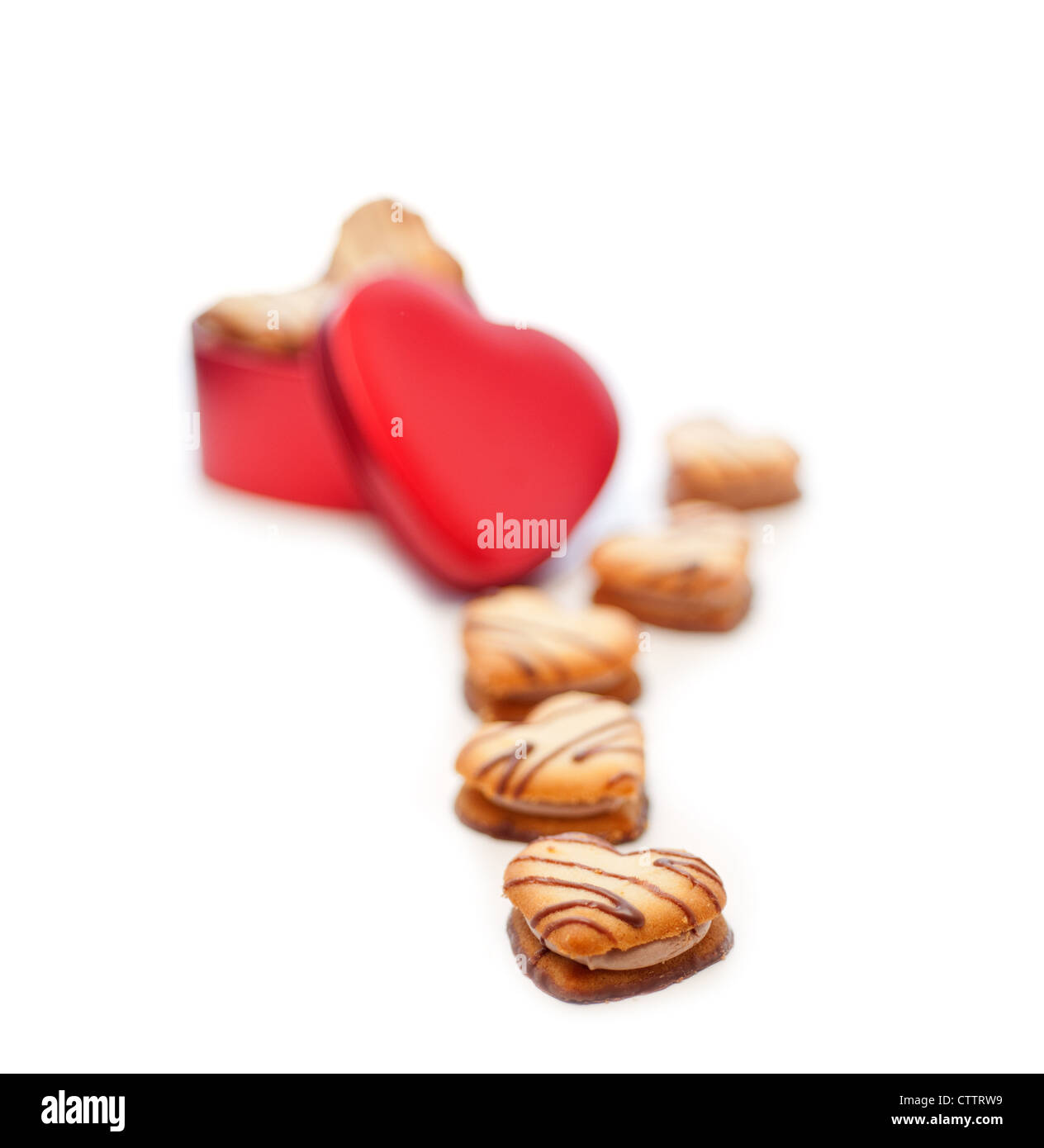 heart shaped cream cookies on red heart metal box Stock Photo - Alamy