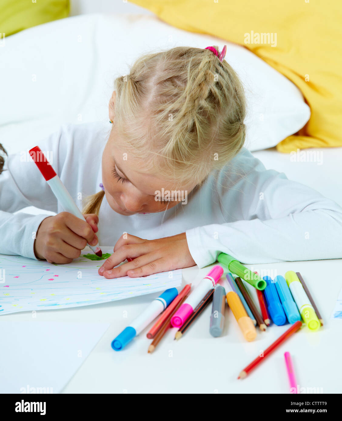 Portrait of lovely girl drawing with colorful pencils Stock Photo - Alamy