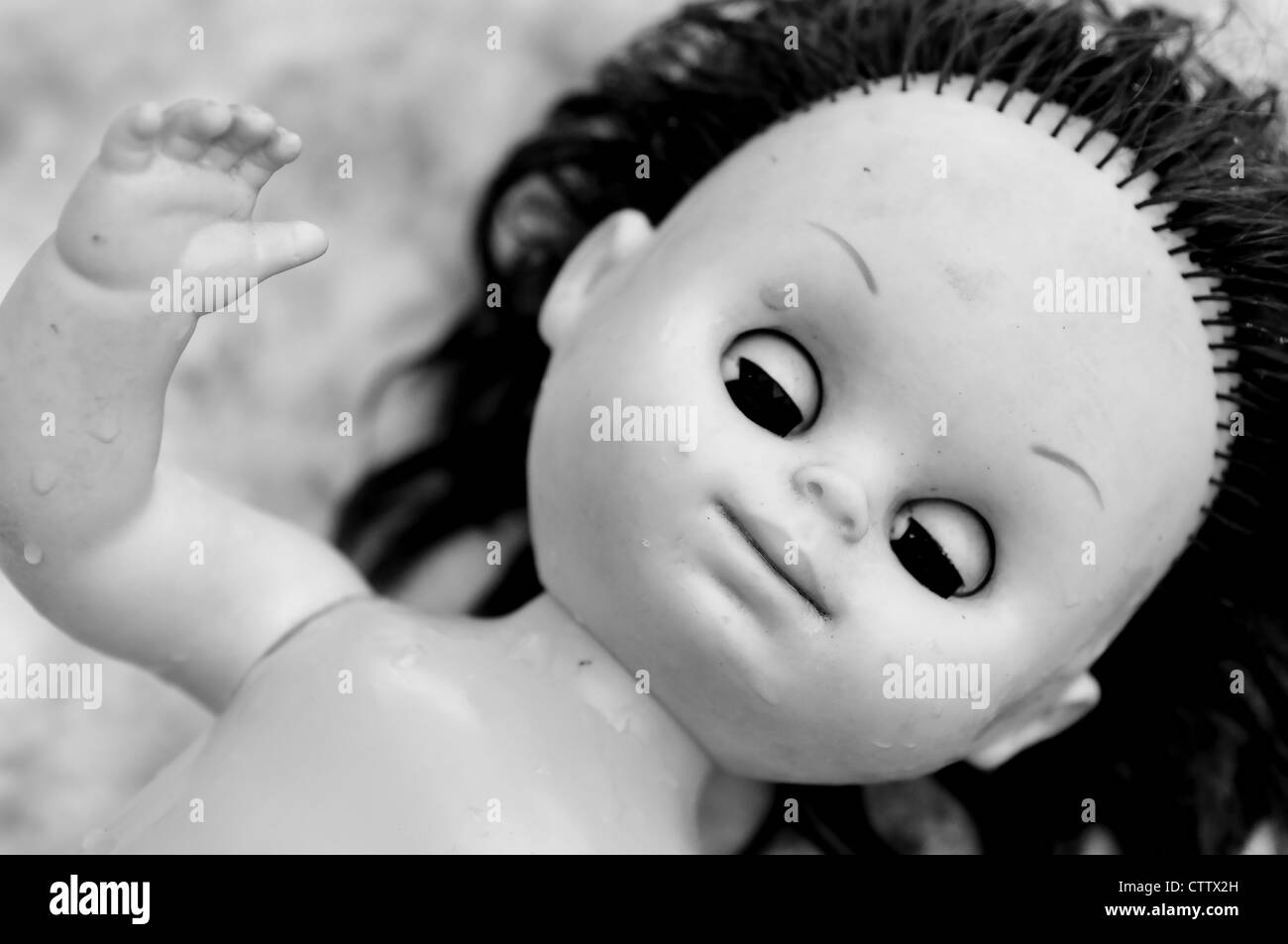 Black and white shot of scary plastic doll Stock Photo - Alamy