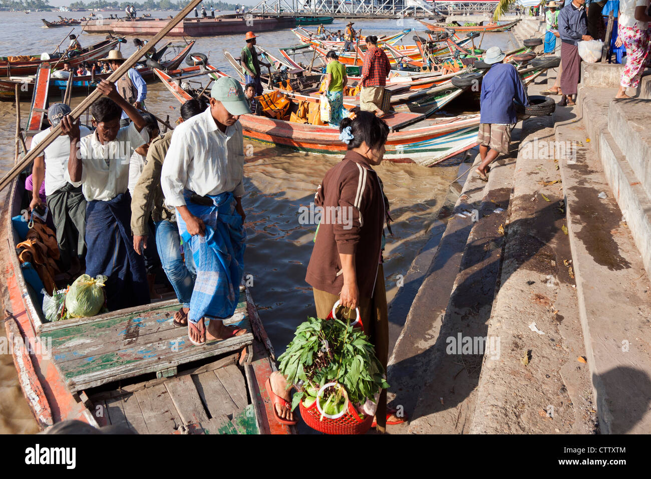 Ferry boats at jetty on Yangon River, Yangon, Myanmar Stock Photo - Alamy
