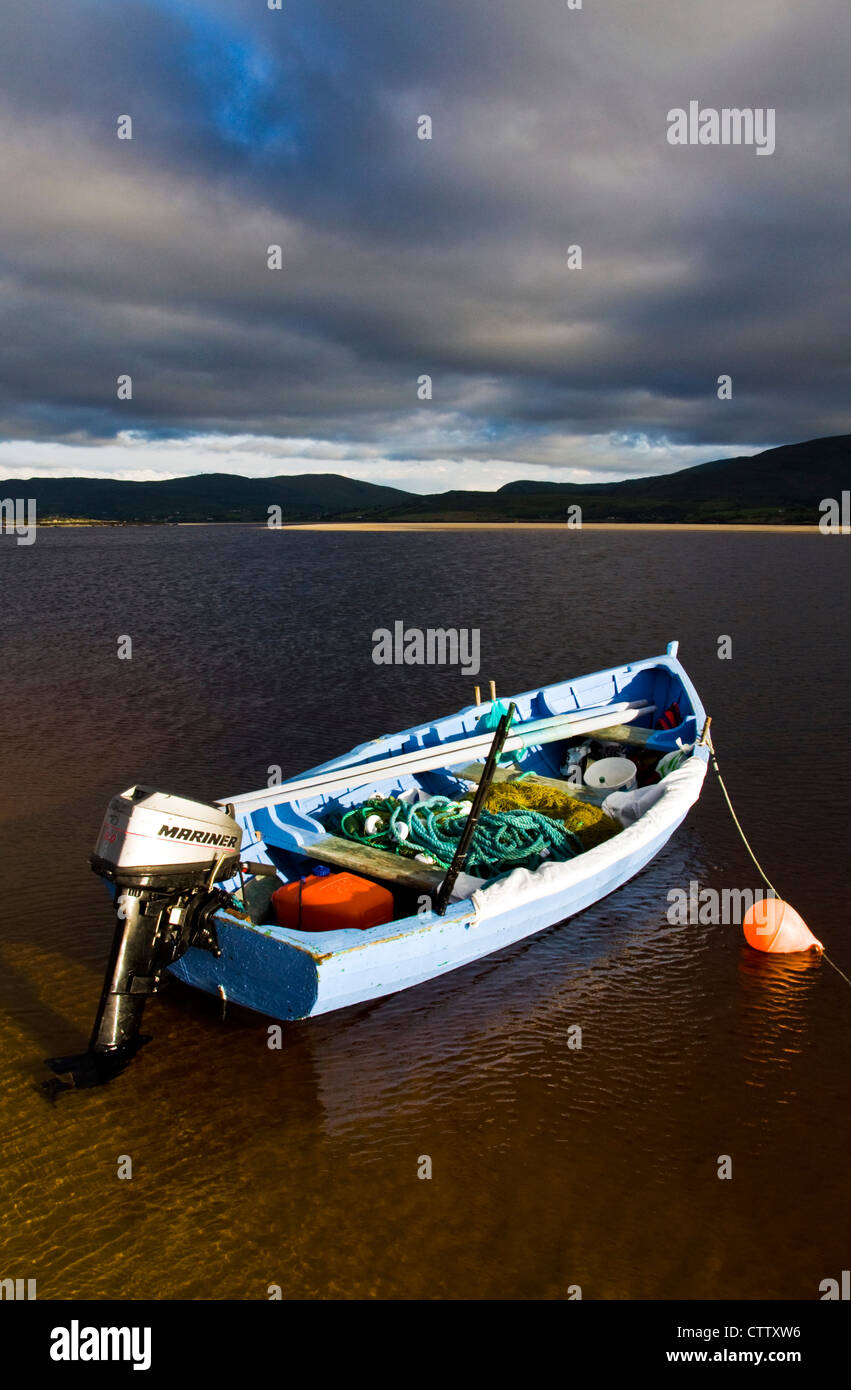 Dramatic evening light on fishing boat Stock Photo - Alamy