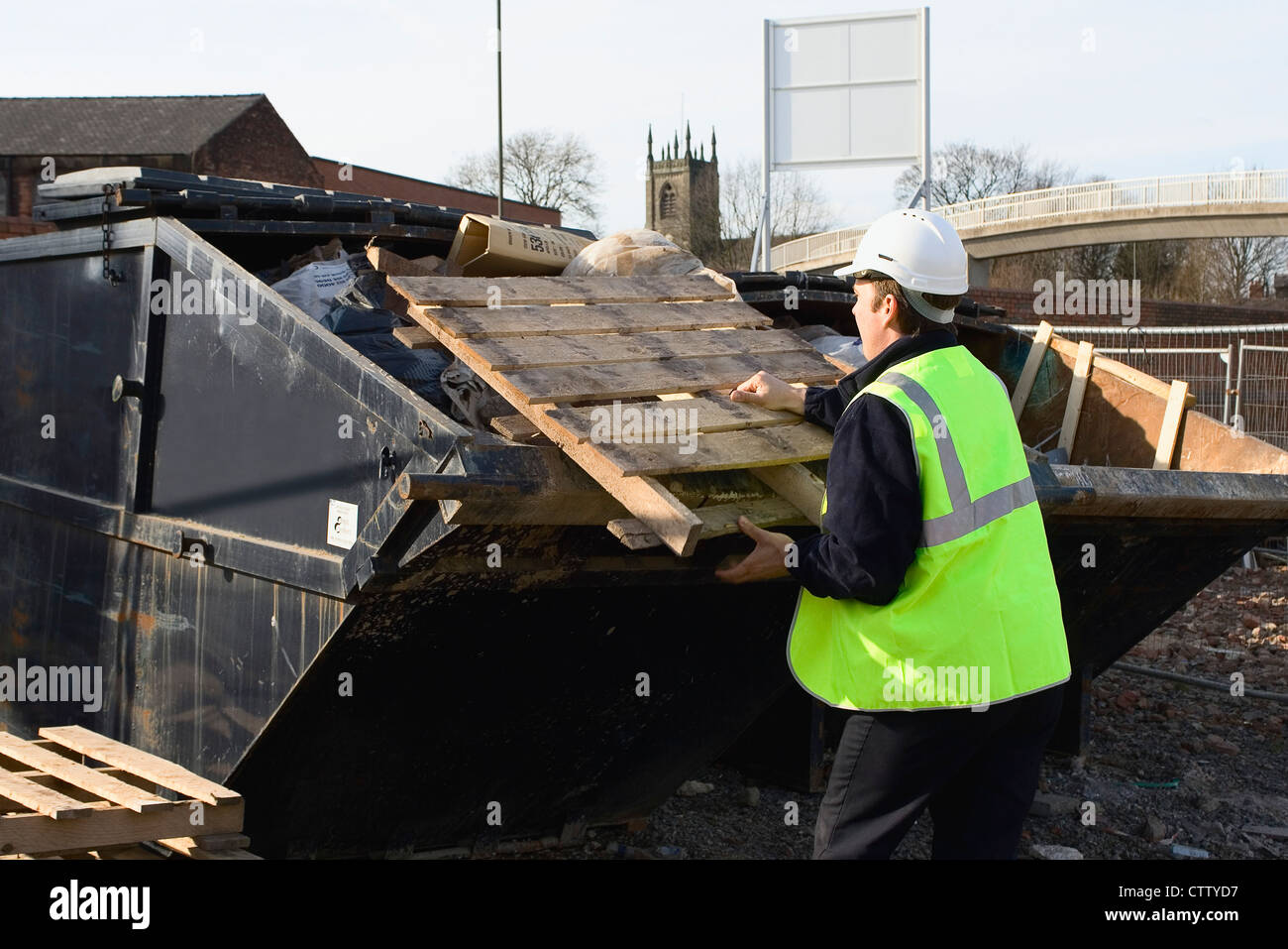 Man segregating waste at housing development UK Stock Photo - Alamy