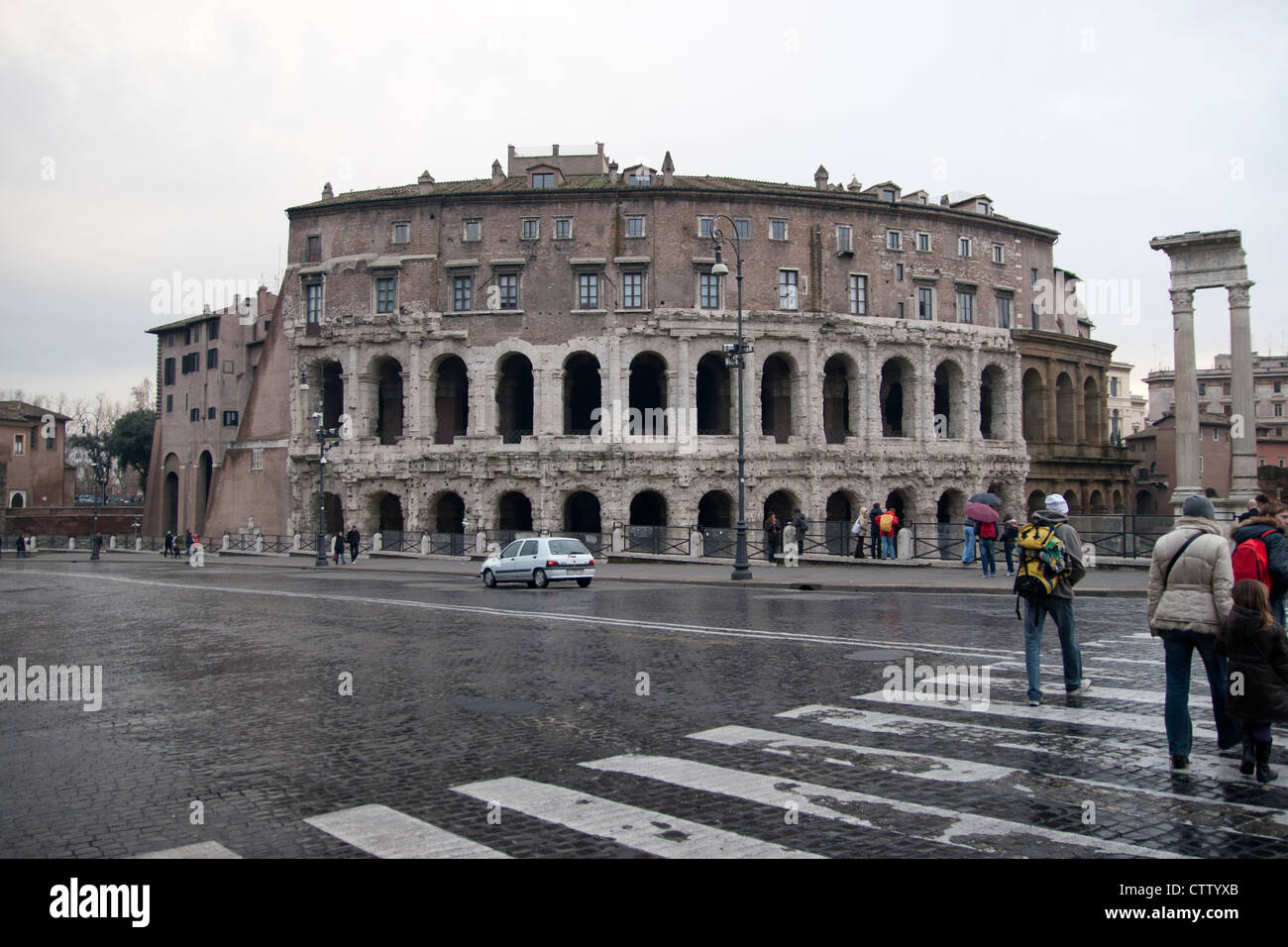 A building with mixed architectural styles and a street in Rome, Italy ...
