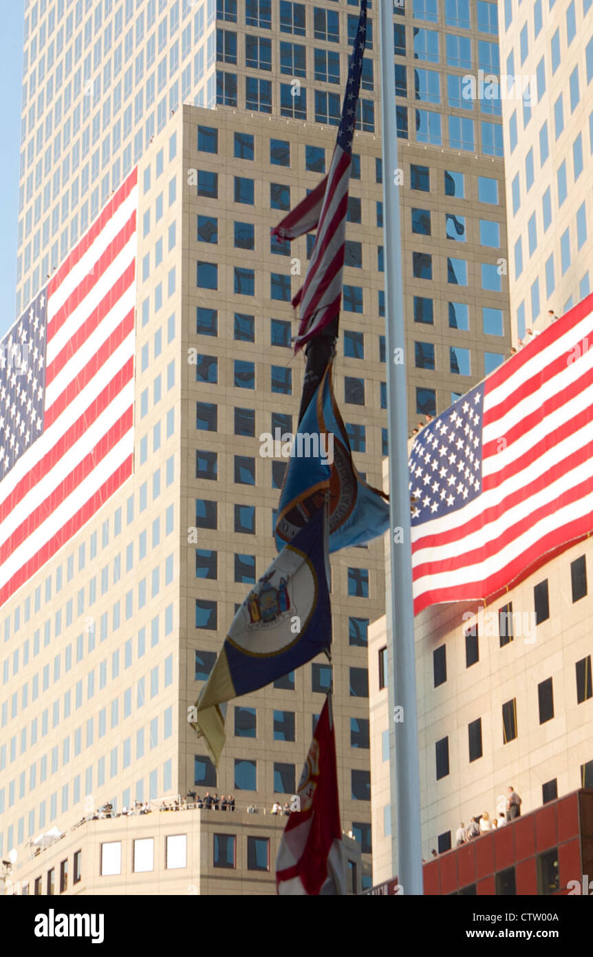 Flags wave near Ground Zero during the one year anniversary with ...