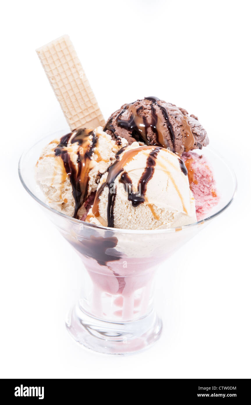 A glass filled with Ice Cream isolated on white Stock Photo - Alamy