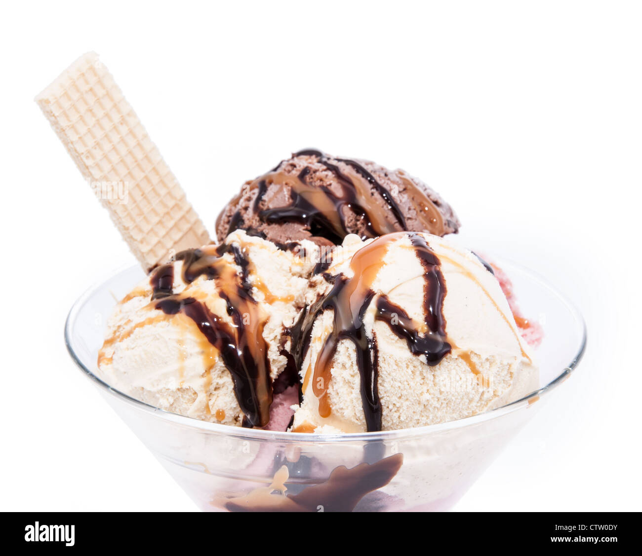 A glass filled with Ice Cream isolated on white Stock Photo - Alamy