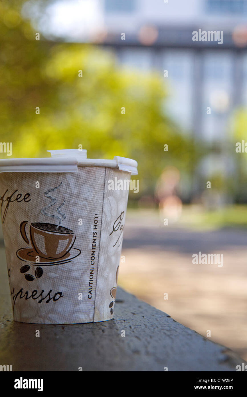 Paper Coffee Cup on Park Bench Stock Photo - Alamy