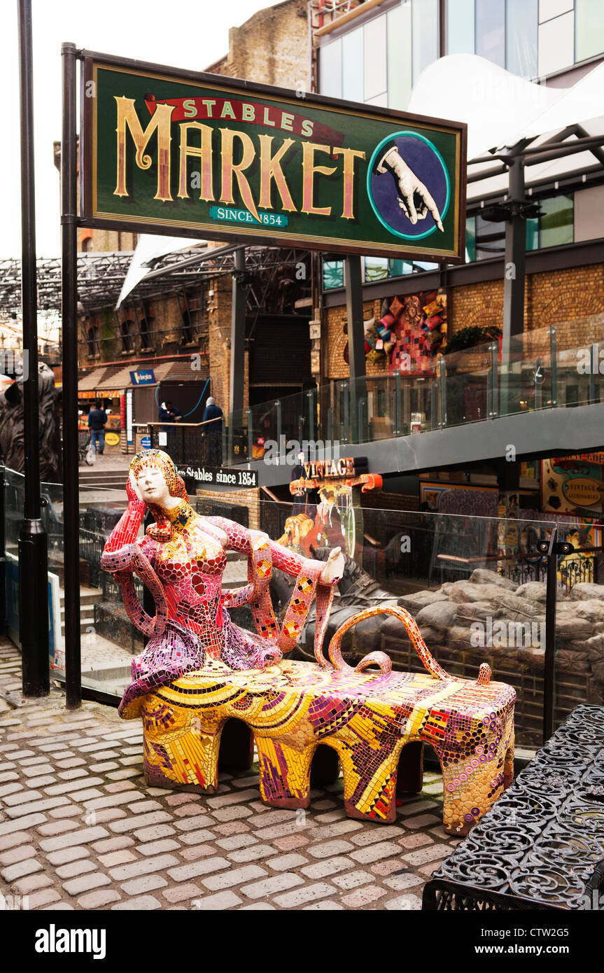 A sculpture, and bench, in the refurbished Stables Market in Camden ...