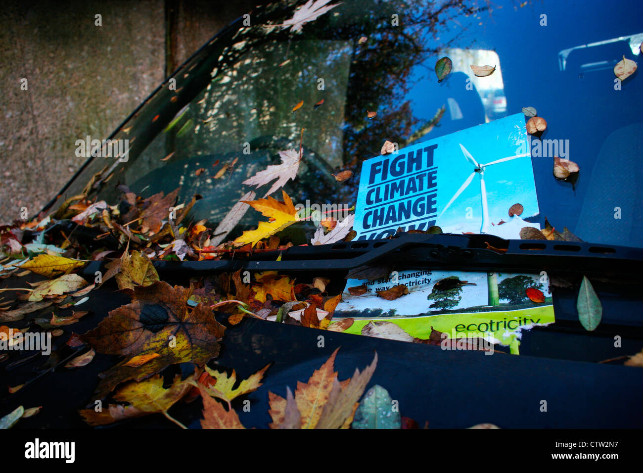 Fight Climate Change fly poster under windscreen wiper Stock Photo - Alamy