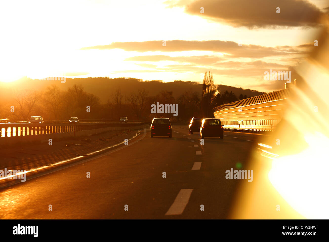 sunrise drive on car Stock Photo - Alamy