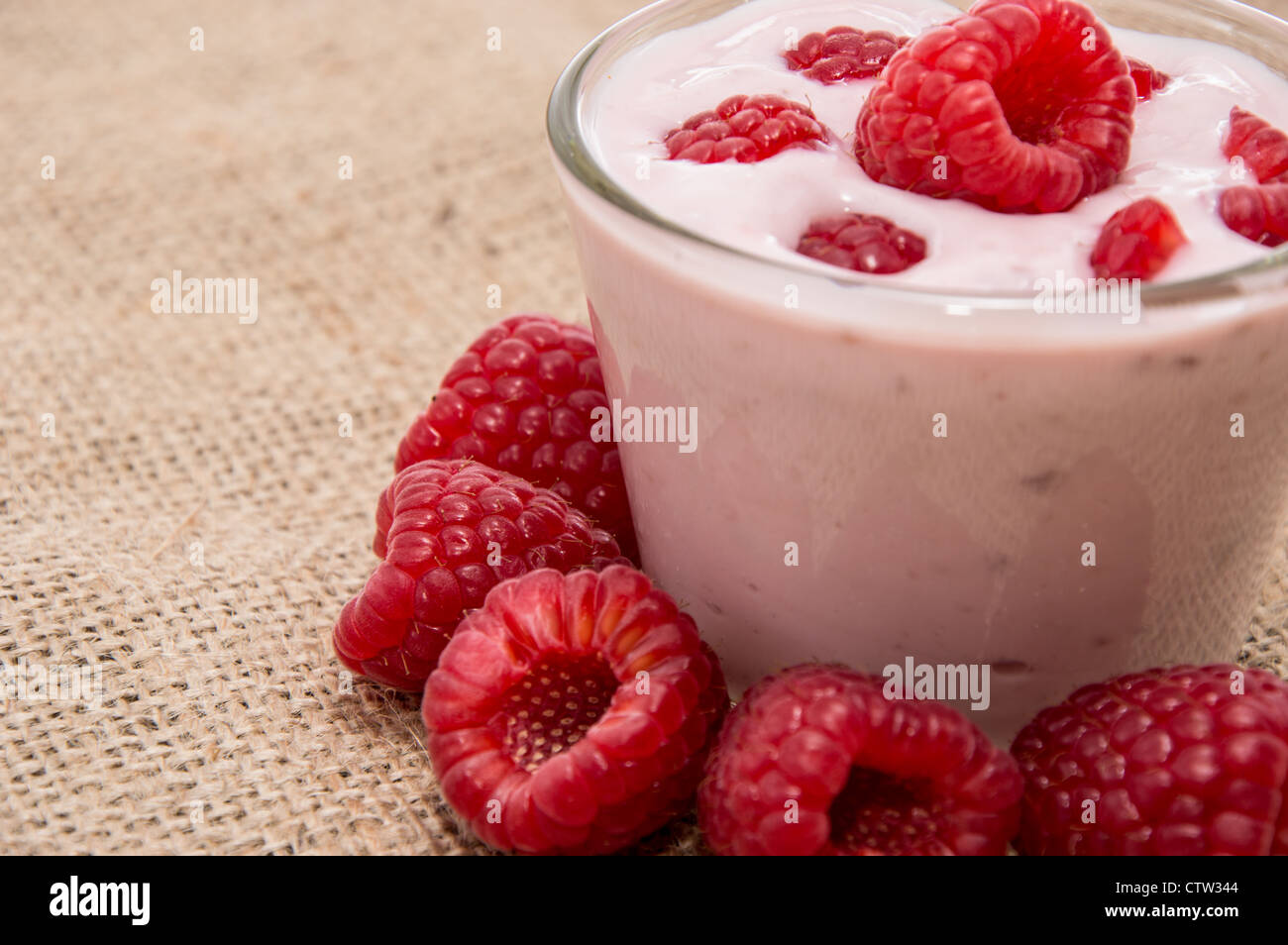 Fresh made Rasperry Yogurt on rustic background Stock Photo - Alamy