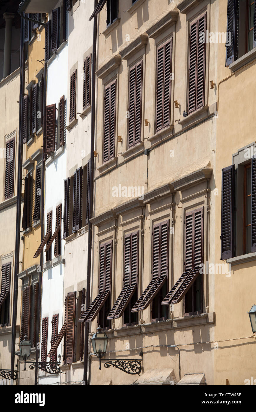 City of Florence, Italy. Shuttered windows of offices and apartments ...